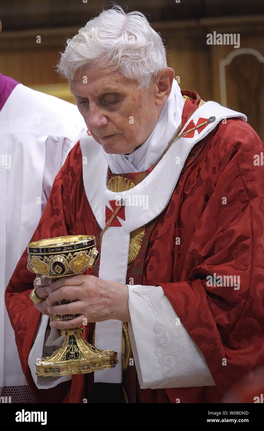 Pope Benedict XVI holds a mass and bestows the pallium on 44 new ...