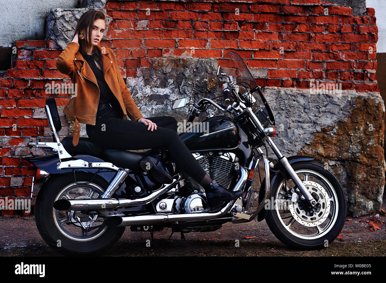 Woman posing motorcycle hi-res stock photography and images - Alamy