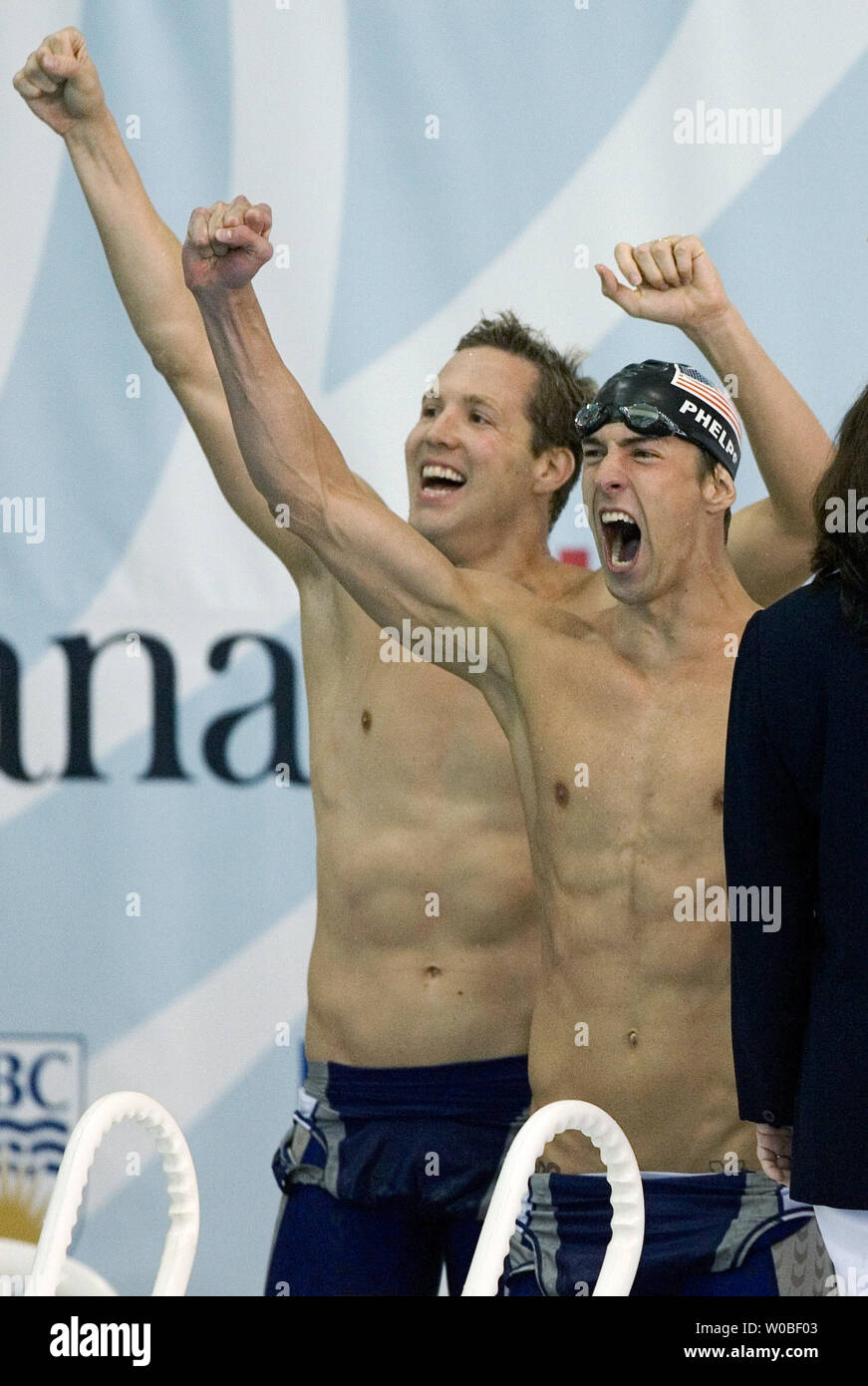Team USA's Neil Walker (back) and Michael Phelps celebrate setting a ...