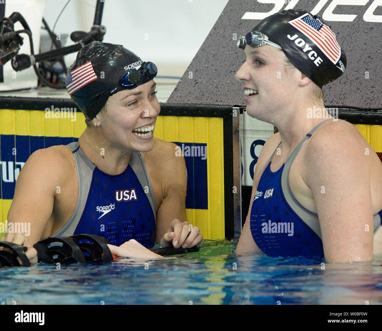 Kara Lynn Joyce (R) and Natalie Coughlin, both USA, celebrate gold and ...
