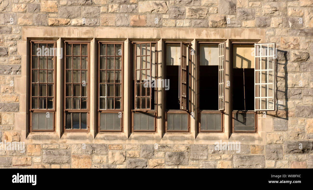 Windows on the second floor of Norris Hall at Virginia Tech remain open ...
