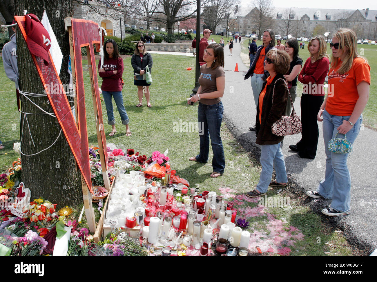 Virginia Tech students visit a memorial for the 33 students who died in ...