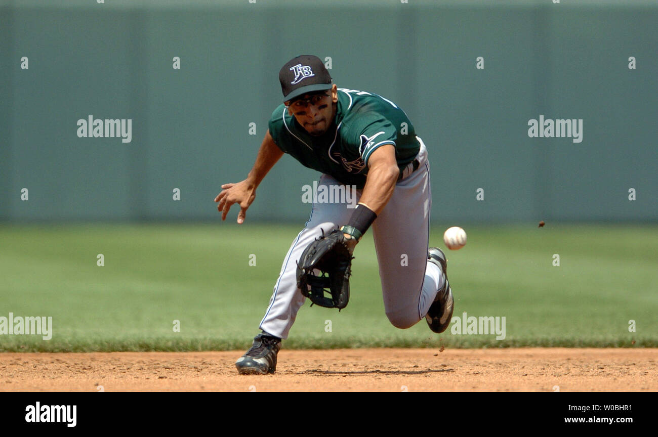 Julio Lugo of the Tampa Bay Devil Rays fields a hard hit grounder in ...