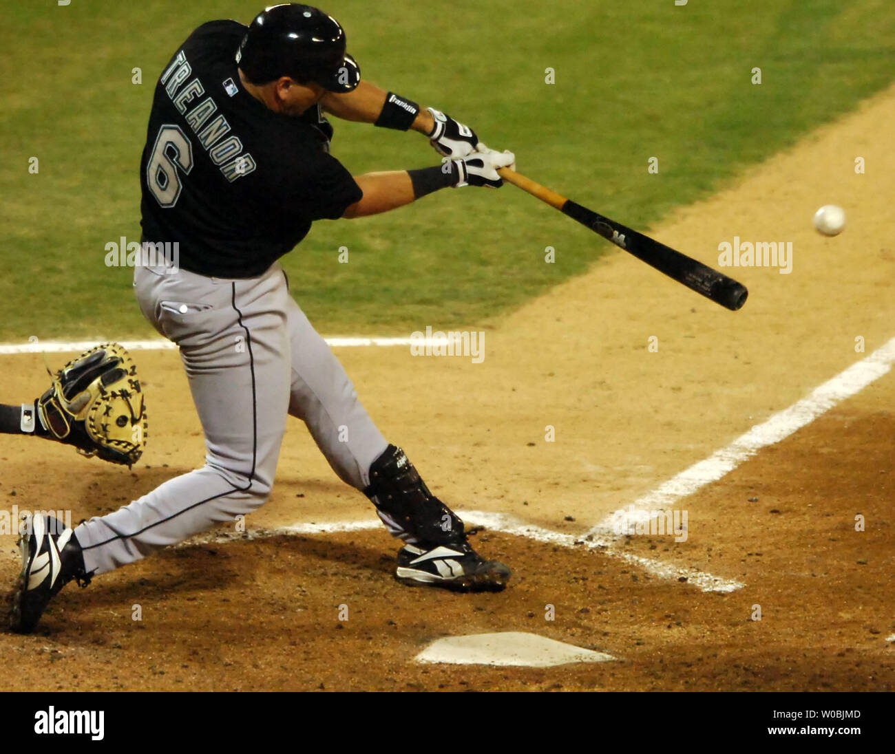 The Florida Marlins Matt Treanor hits an RBI single in the fifth inning ...