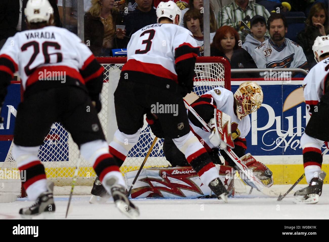 Goalie Ray Emery (1) of the Ottawa Senators blocks a shot on goal by ...
