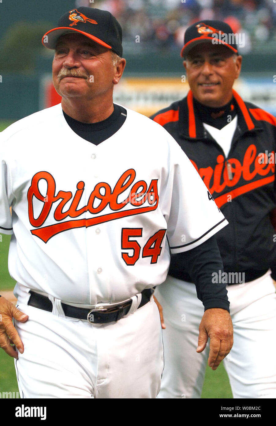 The Baltimore Orioles pitching coach Leo Mazzone (54) smiles as Manager ...