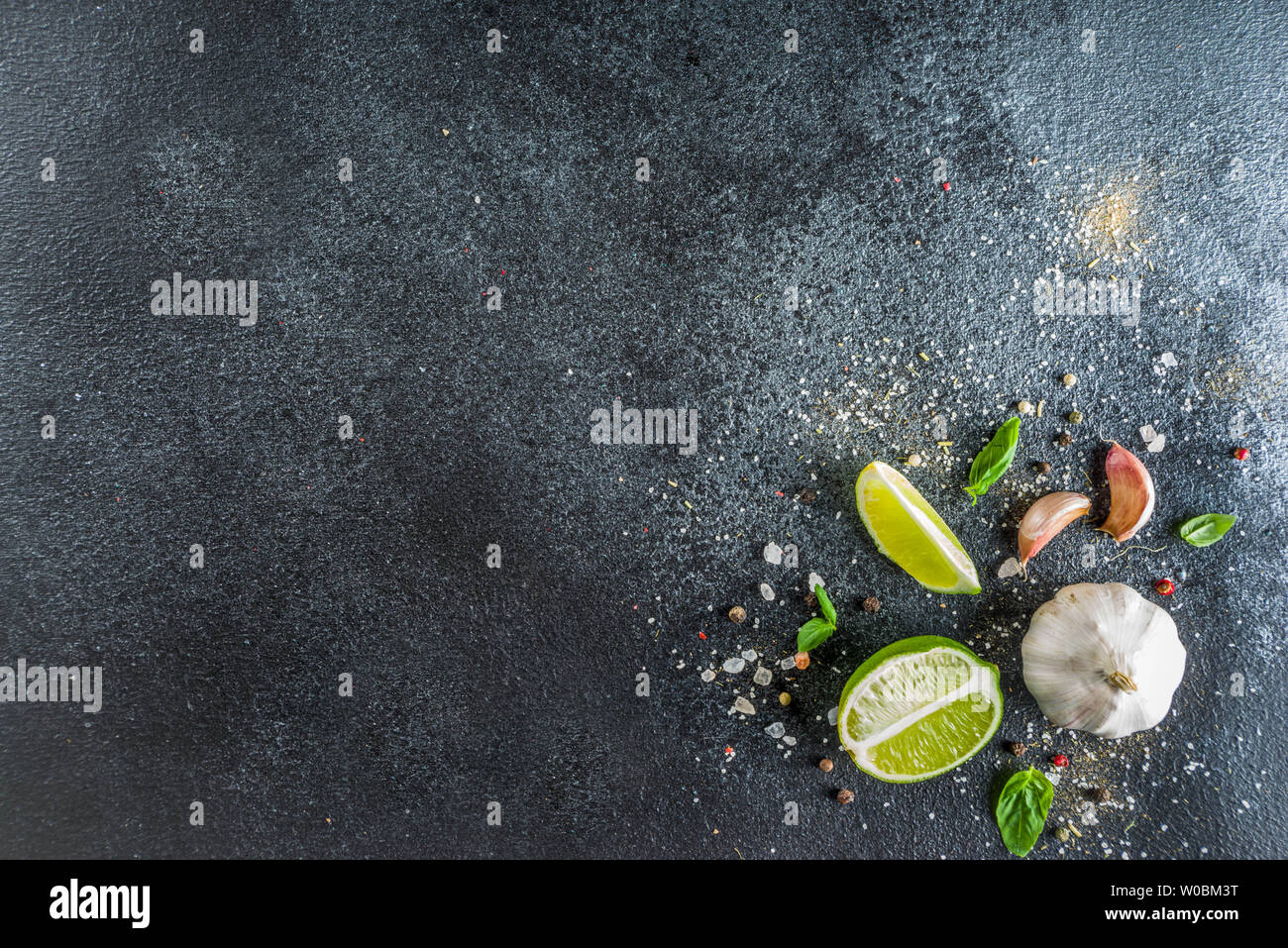 Cooking food stone concrete background with spices, olive oil, garlic ...