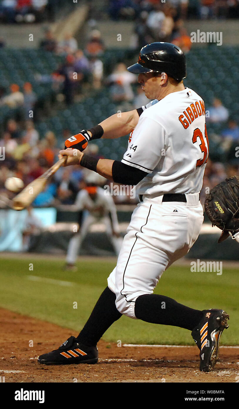 The Baltimore Orioles Jay Gibbons hits a double in the fourth inning ...