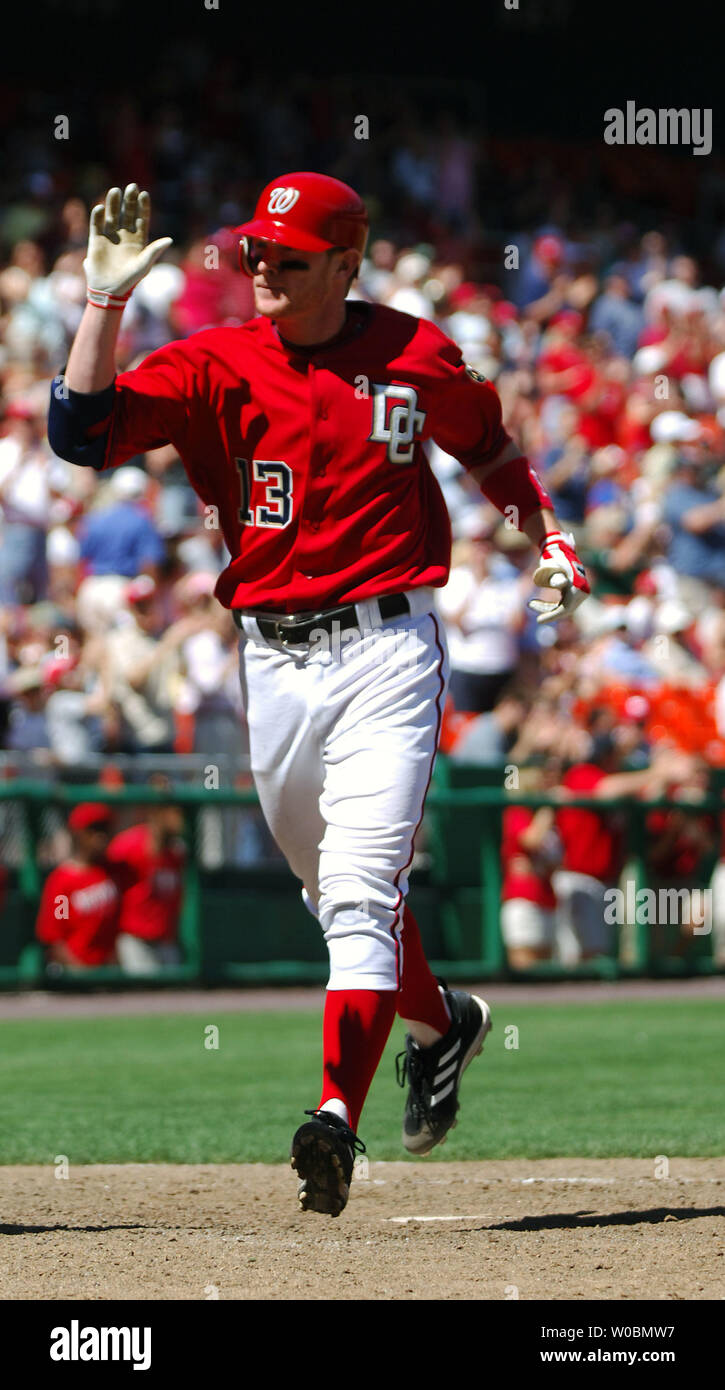 The Washington Nationals Robert Fick (13) crosses home plate after ...