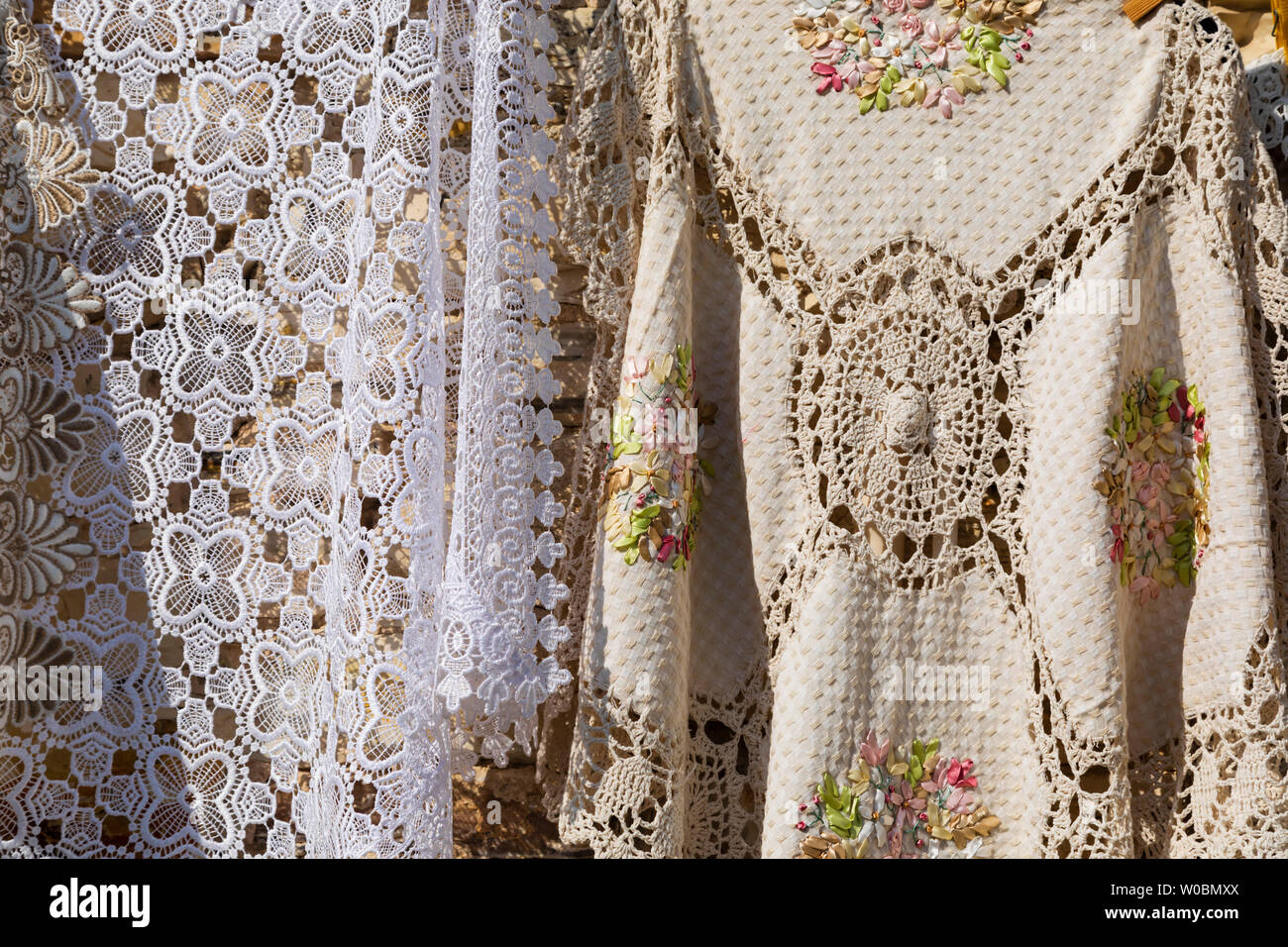 Examples of Lefkara lace hanging outside a shop, Pano Lefkara, Cyprus ...