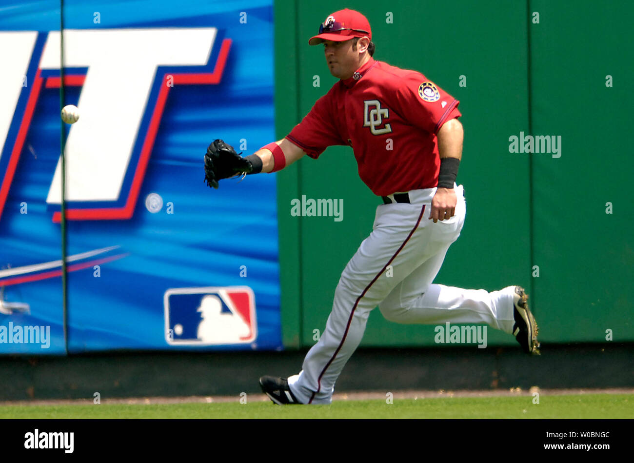 The Washington Nationals Ryan Church (19) cannot make a catch in the ...