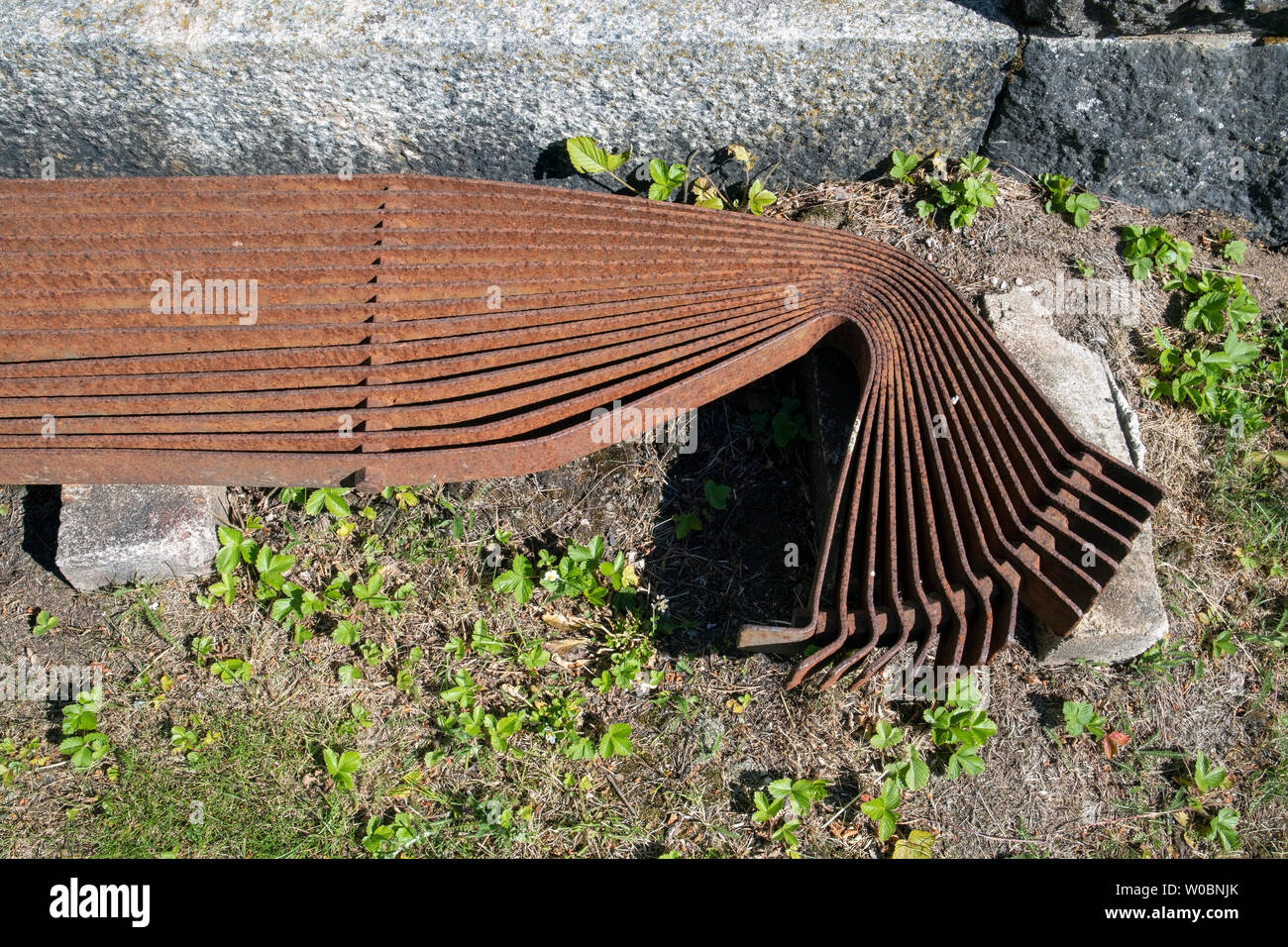 rusty old metal grid on ground Stock Photo - Alamy