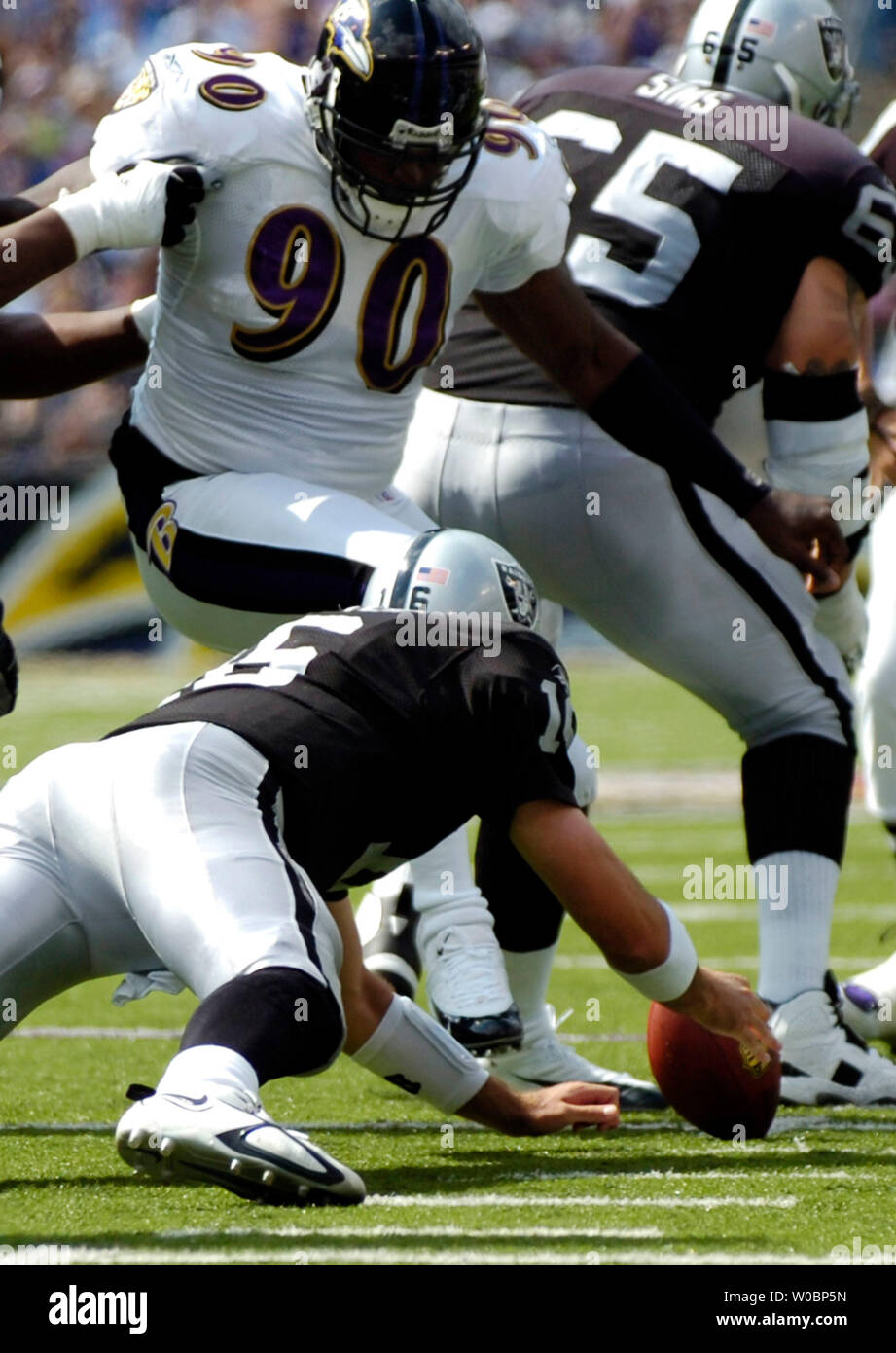 The Oakland Raiders Andrew Walter (16) recovers his own fumble in the ...