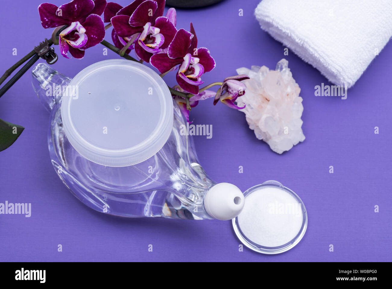 Neti Pot, pile of Saline, Purple Orchid Flowers, Clear Quartz Cluster ...