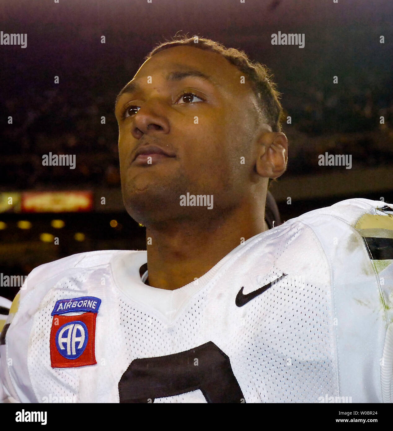 Army wide receiver Walter Hill (2) stands during the singing of the ...