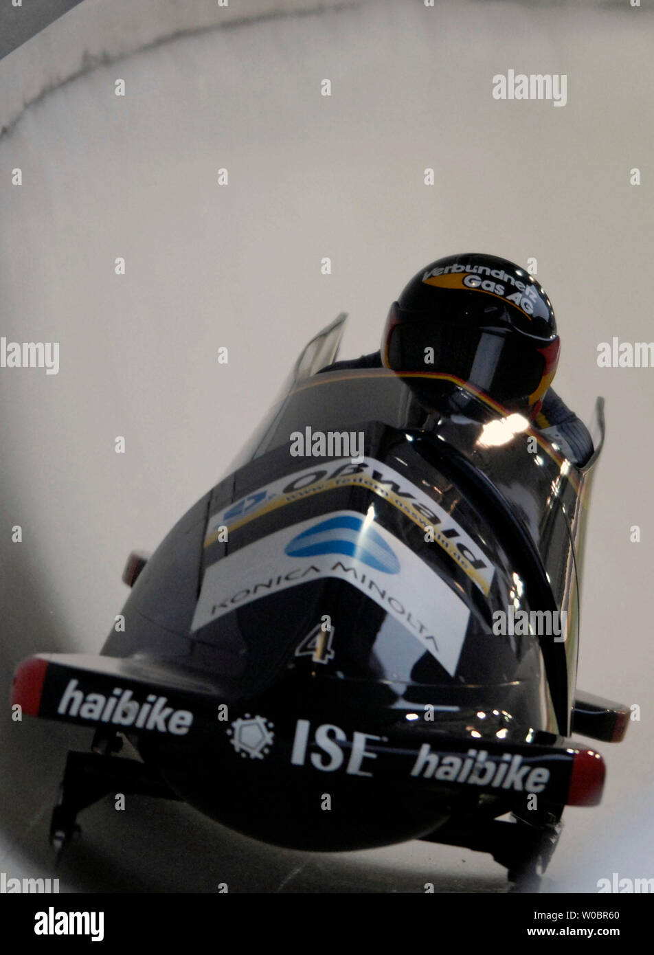 The German two-man bobsled, driven by Matthias Hoepfner with Andreas ...