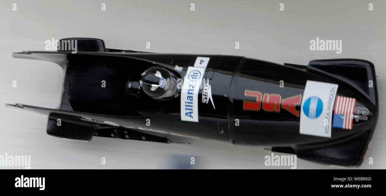 The United States two-man bobsled, driven by Steve Holcomb with Brock ...