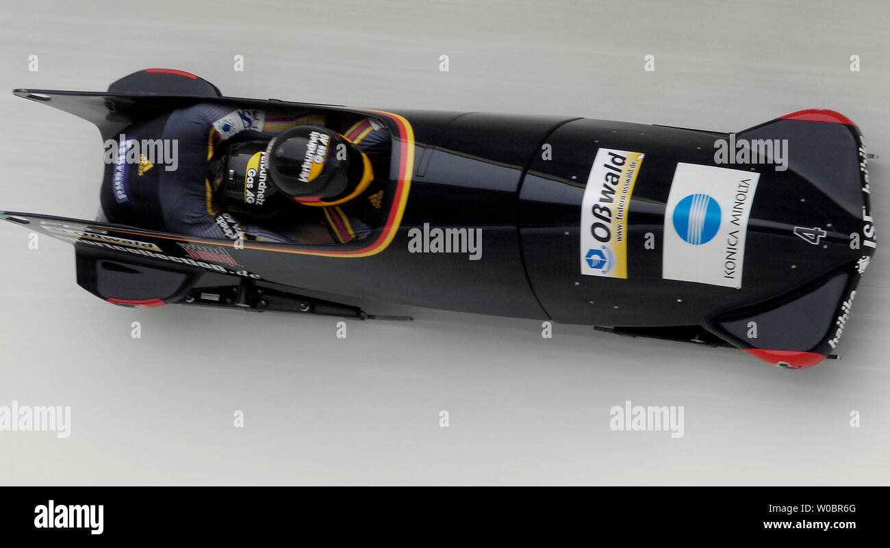 The German two-man bobsled, driven by Andre Lange with Kevin Kuske on ...