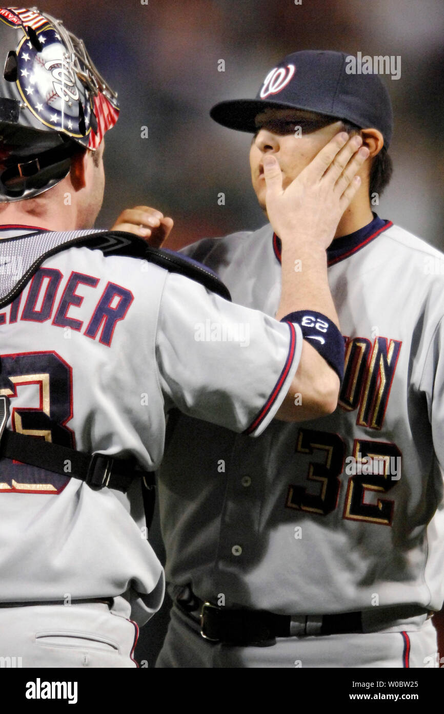 Washington Nationals pitcher Chad Cordero (32) is congratulated by ...