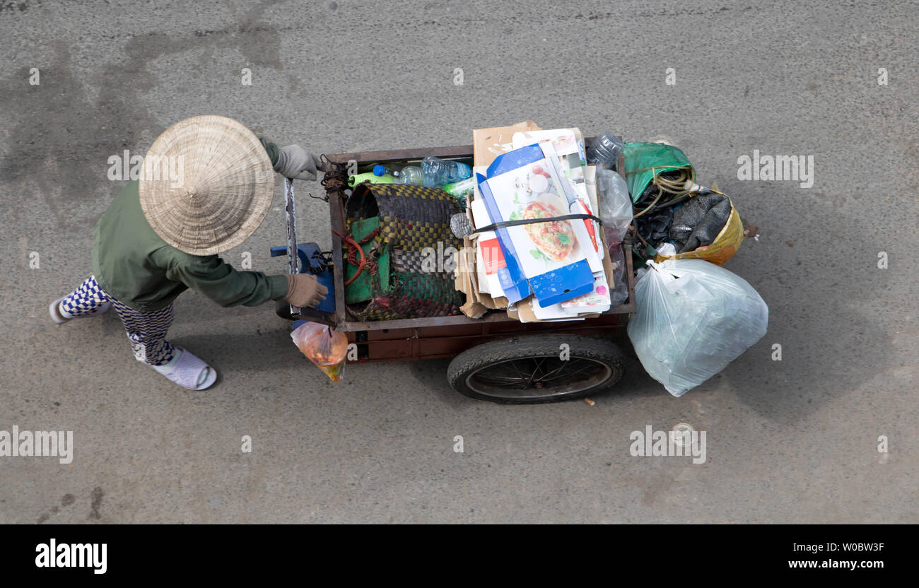 Homeless woman cart hi-res stock photography and images - Alamy
