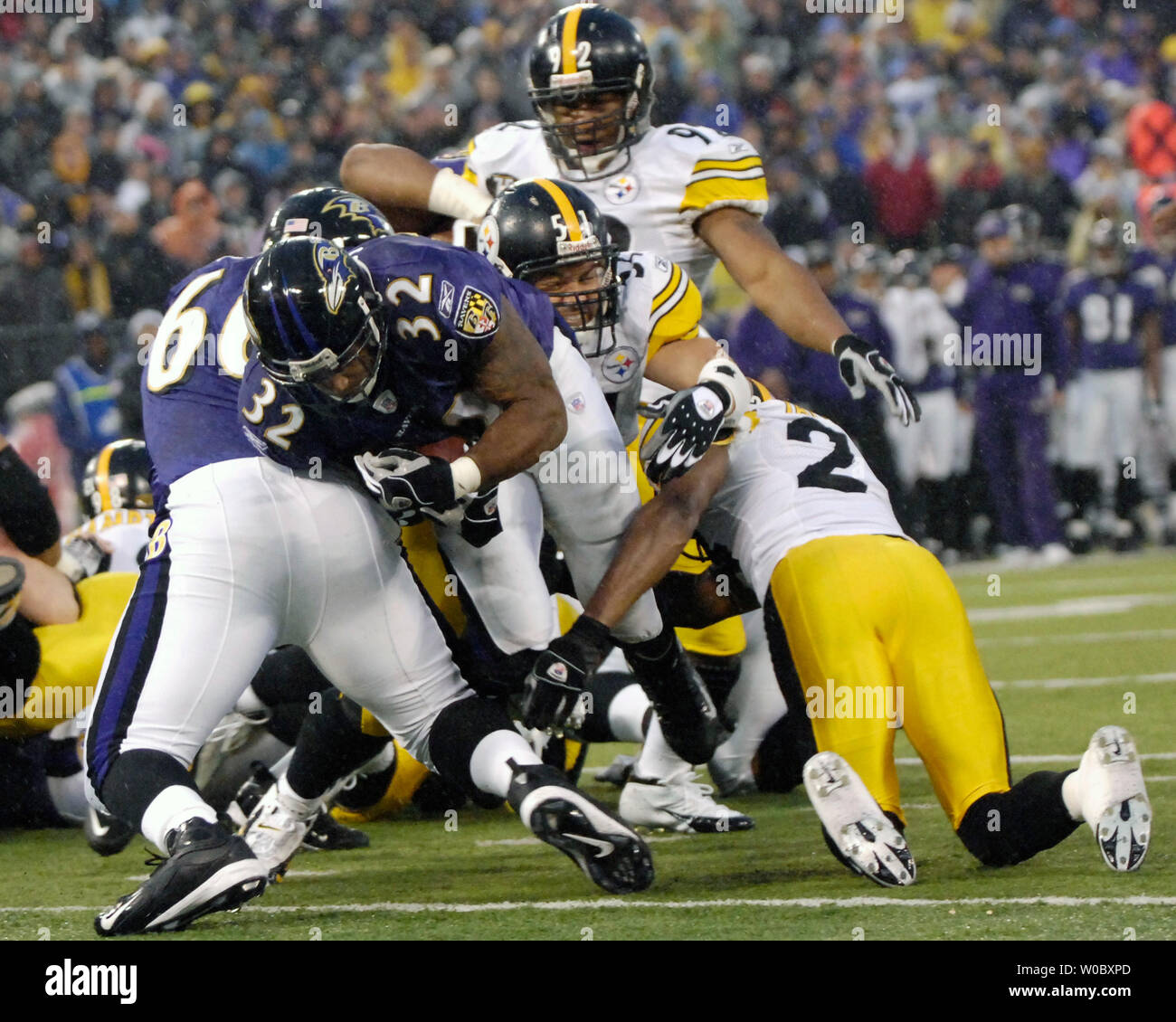 Baltimore Ravens running back Musa Smith (32) runs for a 2-yard ...