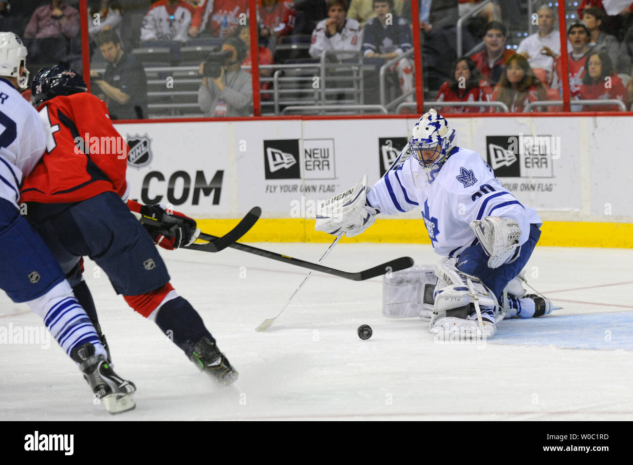 Toronto Maple Leafs goalie Ben Scrivens (30) blocks the shot of ...