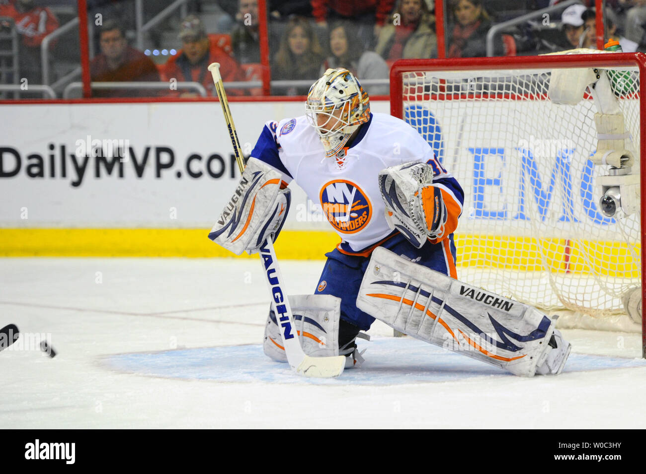 New York Islanders goalie Chad Johnson (30) makes a save against the ...