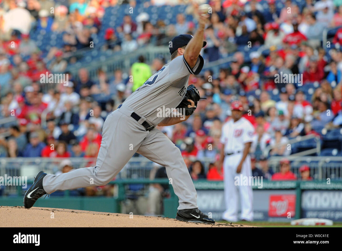 New York Yankees starting pitcher Adam Warren (43) pitches against the ...
