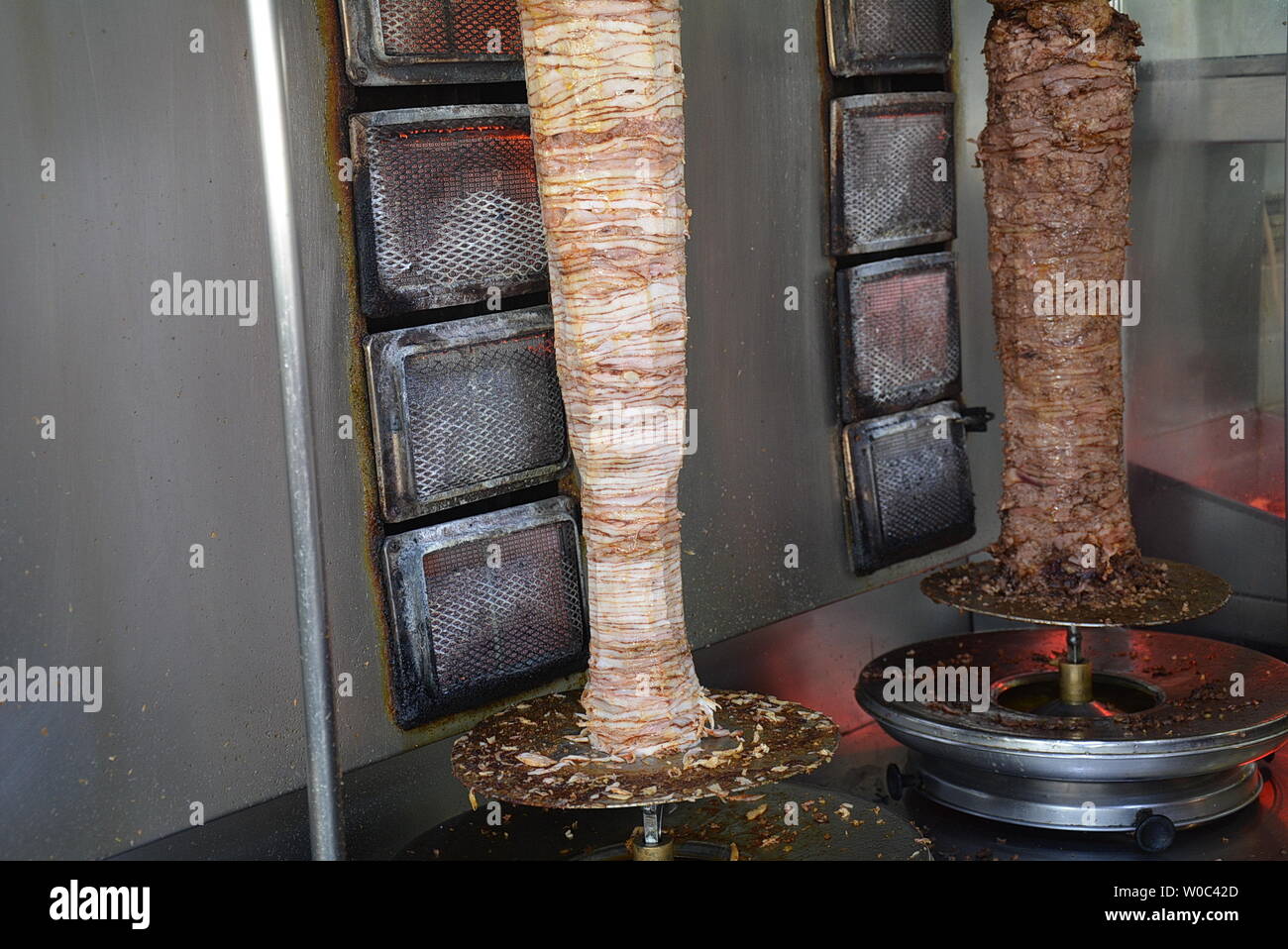 Delicious slabs of skewered fast food Shawerma chicken and lamb meat ...