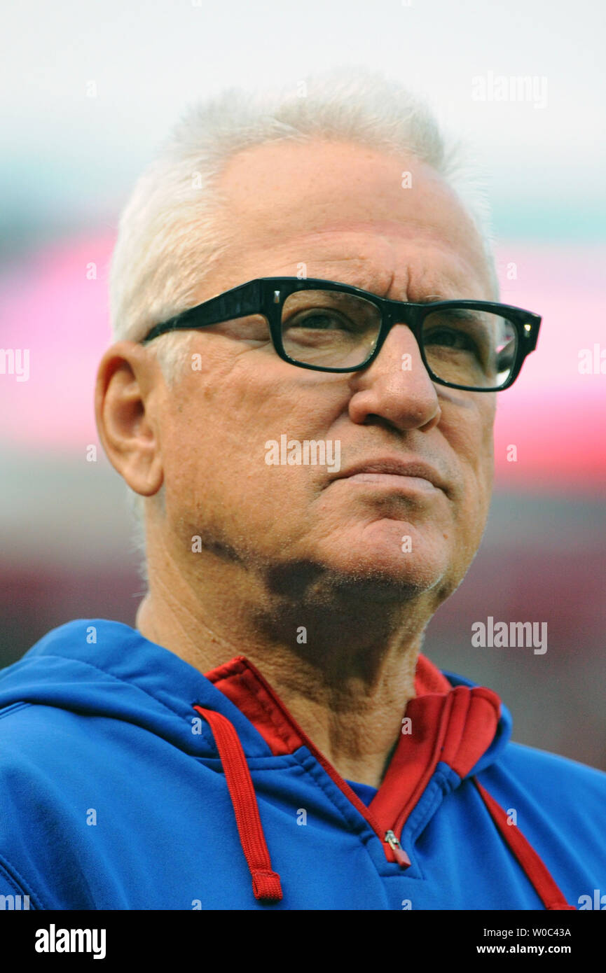 Chicago Cubs manager Joe Maddon (70) stands during the National Anthem ...