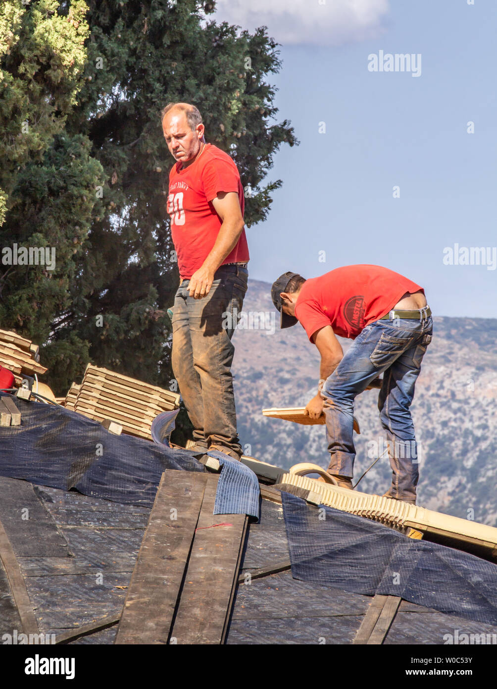 Roofing construction renovation installing hi-res stock photography and ...