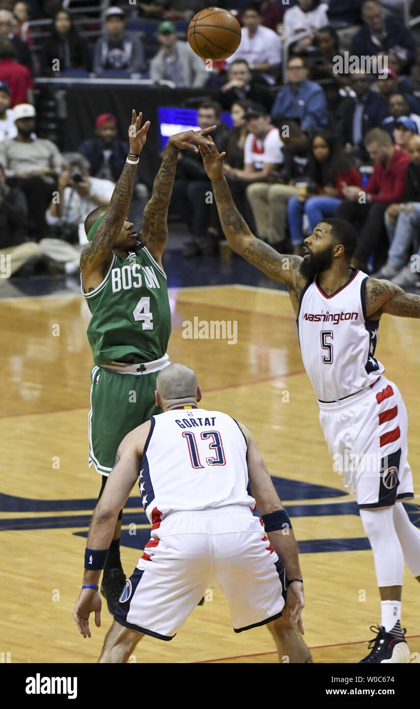 Boston Celtics guard Isaiah Thomas (4) scores against Washington ...
