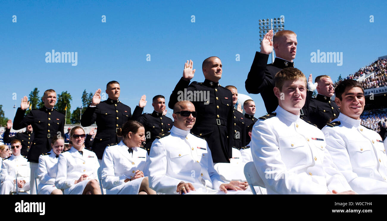 Midshipmen take their oath of office during the Class of 2008 ...