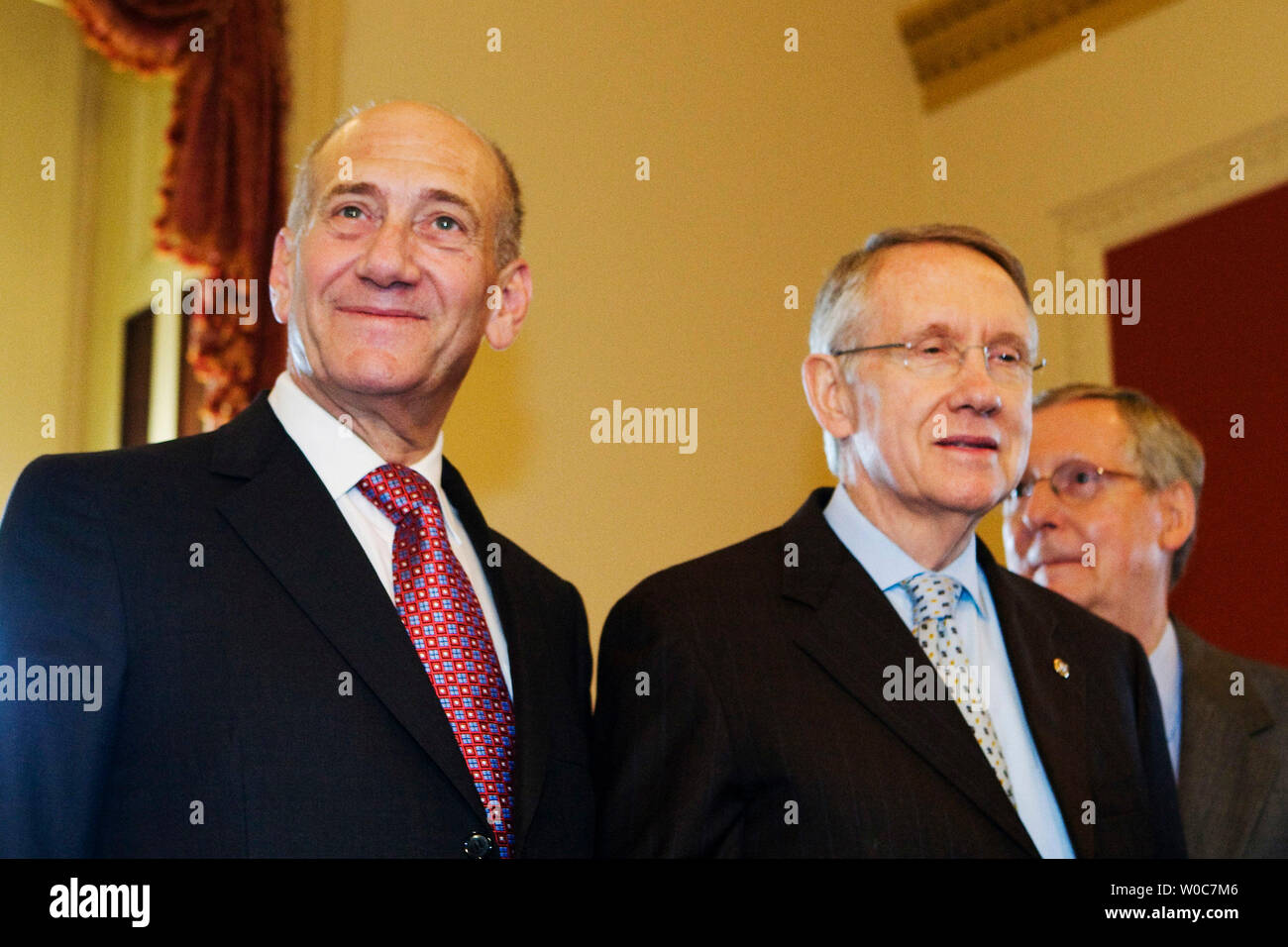 Israeli Prime Minister Ehud Olmert (L) attends a meeting with Sen ...