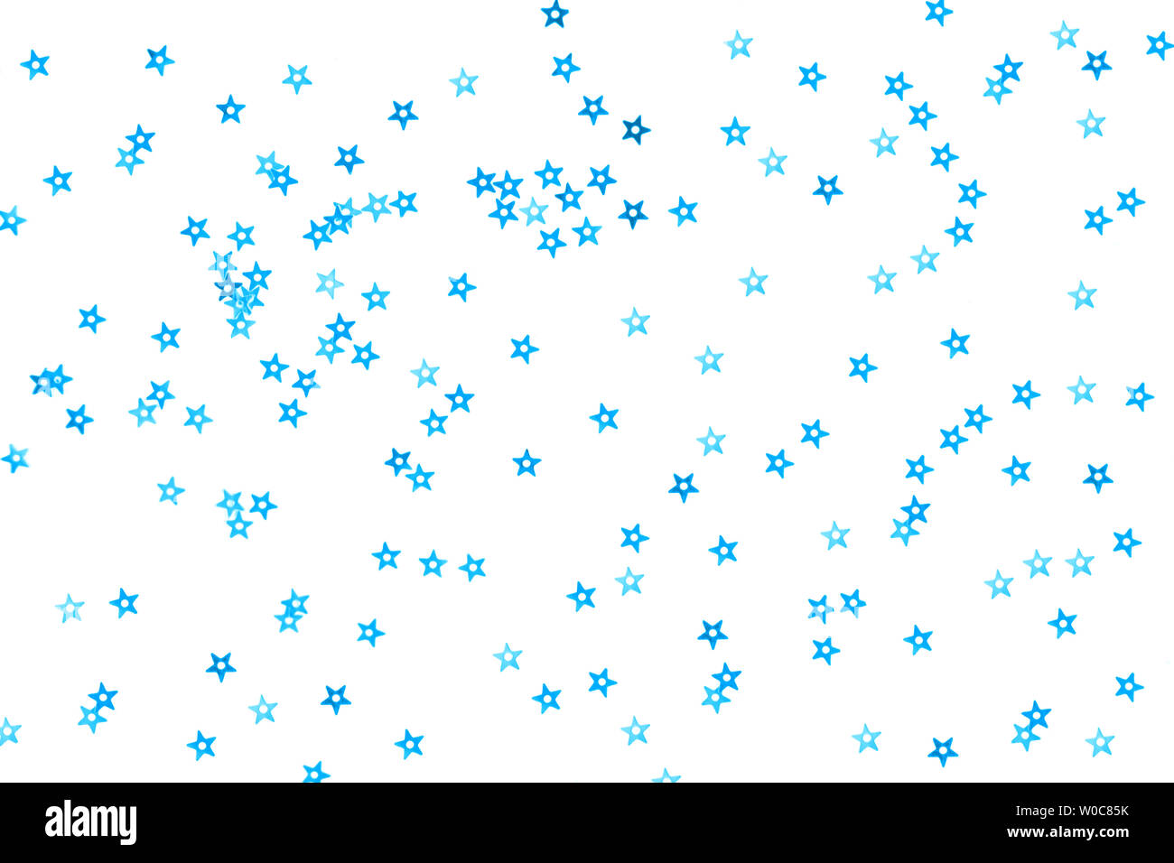 Bunch of blue stars on white background Stock Photo - Alamy