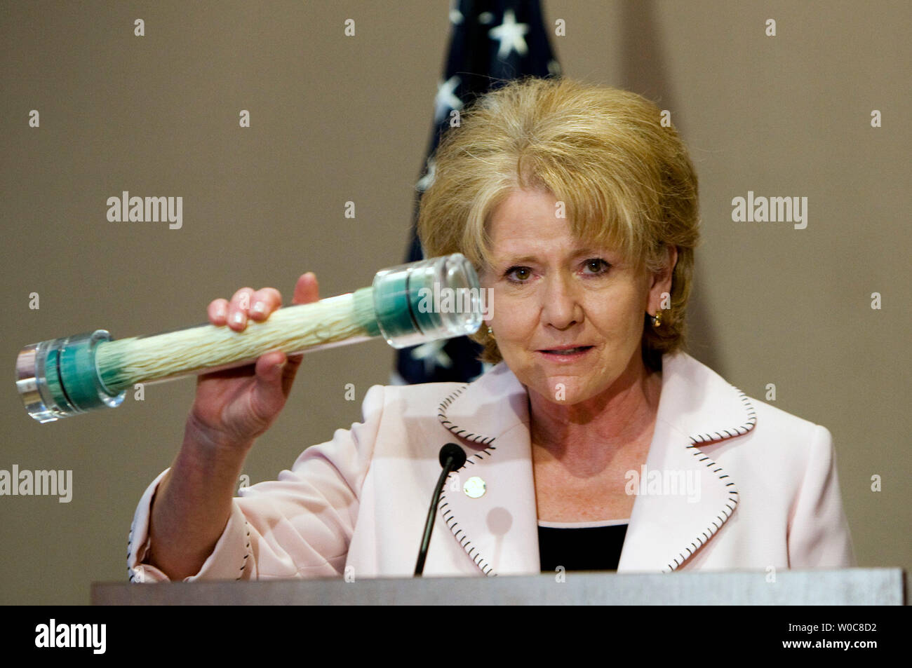 U.S. Transportation Secretary Mary E. Peters, seen holding the new air ...