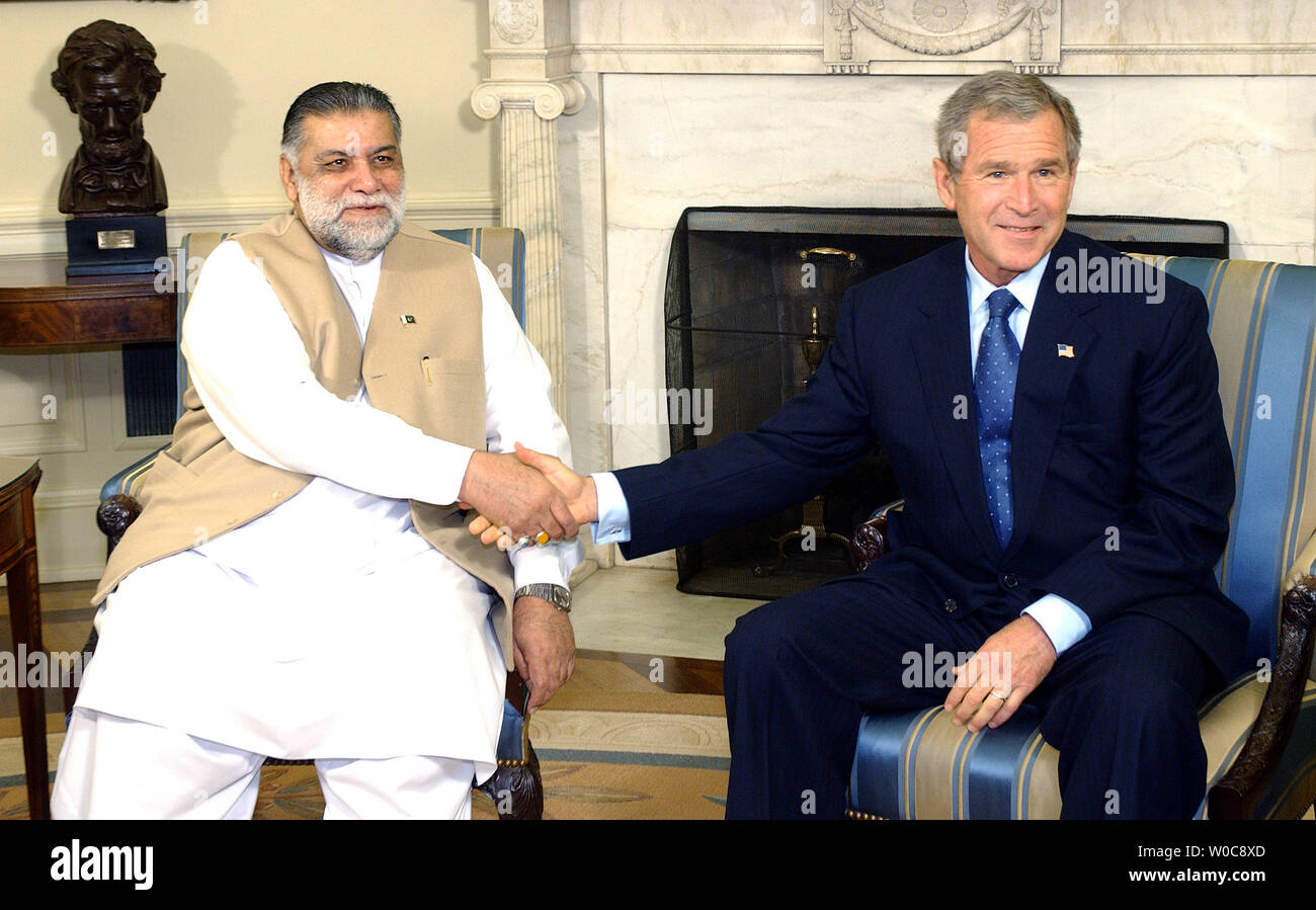 U.S. President George W. Bush shakes hands with Prime Minister of ...