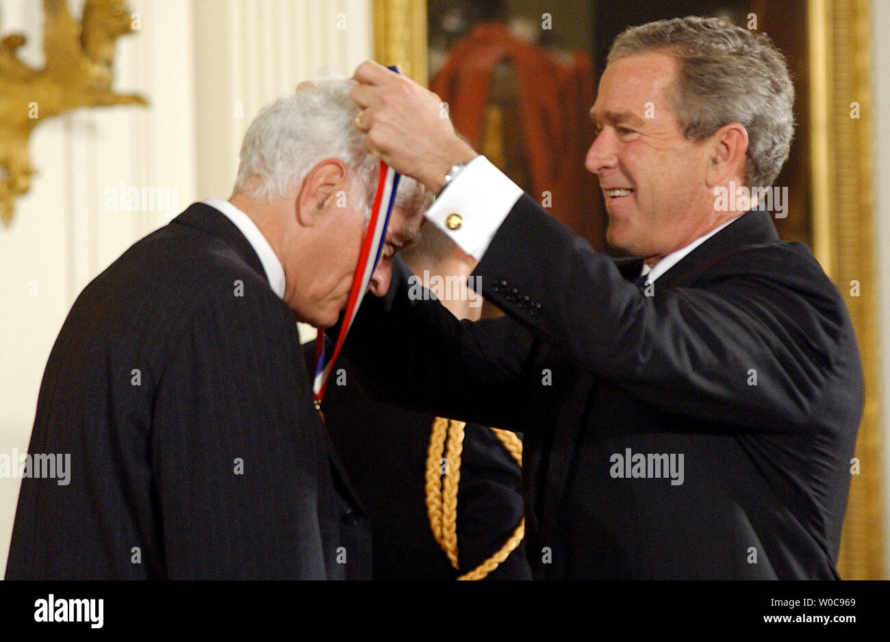 President George W. Bush gives James G. Glimm the 2002 National Medal ...