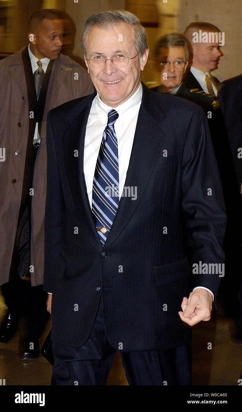 Defense secretary donald rumsfeld arrives hi-res stock photography and ...