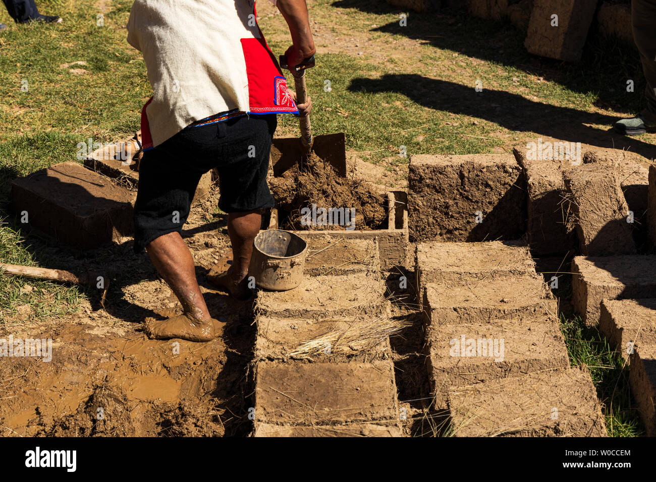 Man making mud bricks hi-res stock photography and images - Alamy