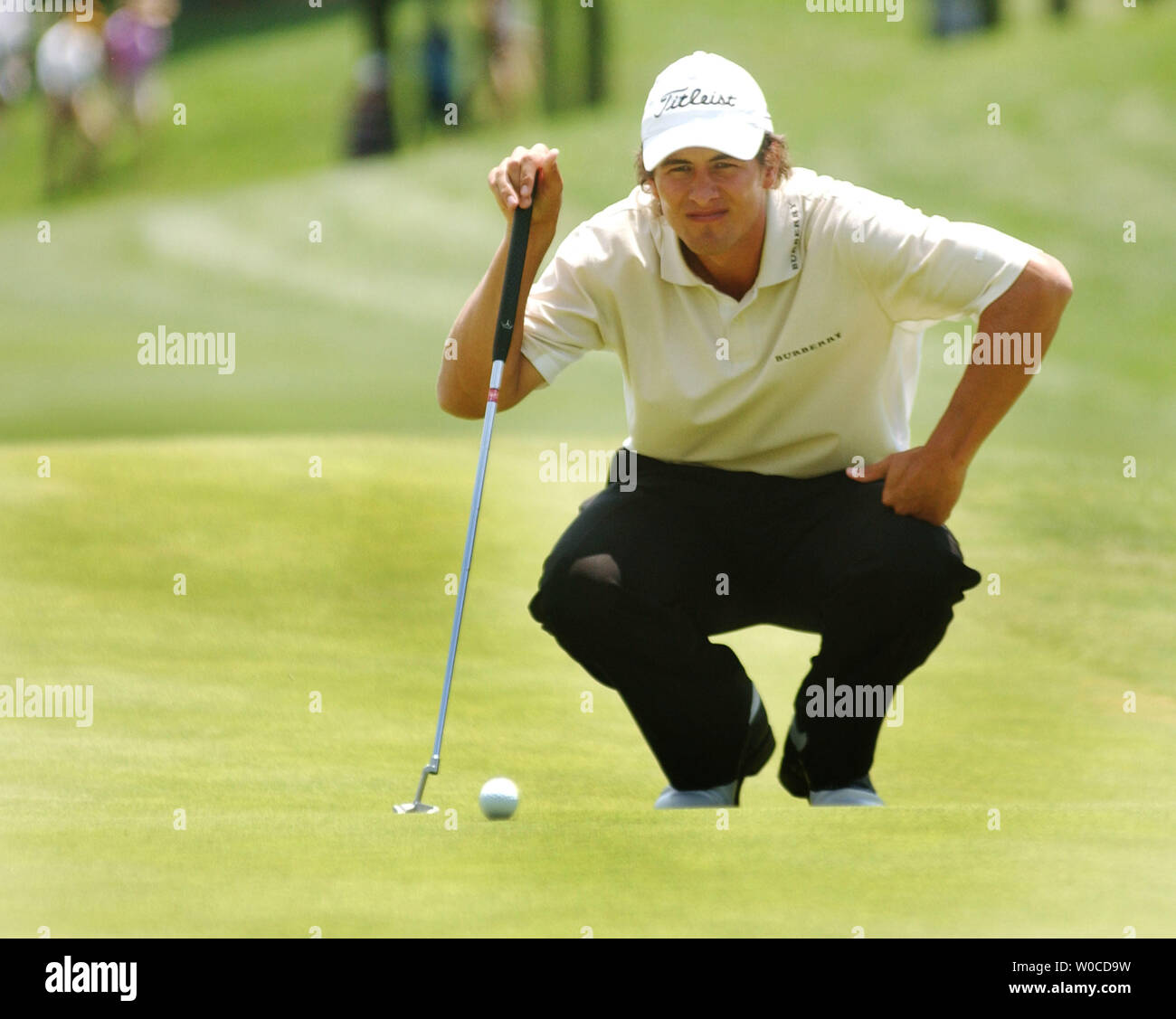 Adam Scott lines up his shot on the 4th hole at the PGA Booz Allen ...