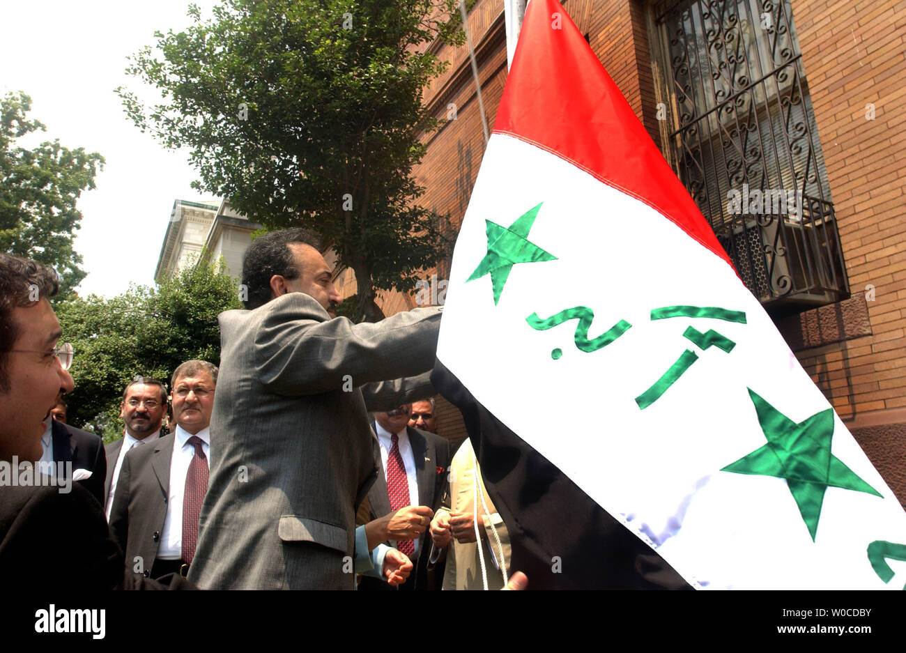 Rend Al Rahim, Chief of Mission for the new Iraqi embassy helps raise ...