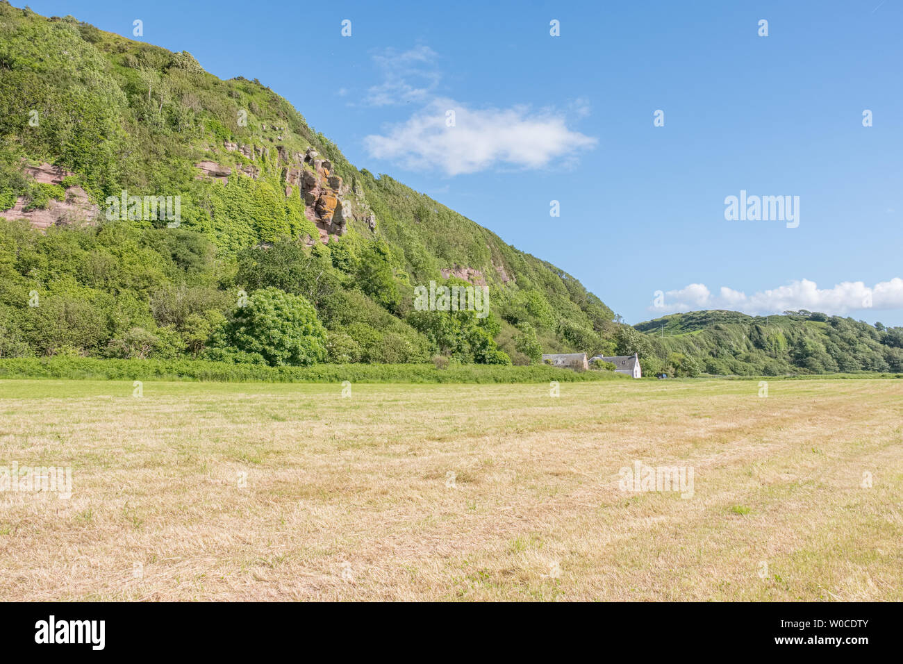 The Holy Caves or Hawking Craig Cave and Rock face structures at side ...