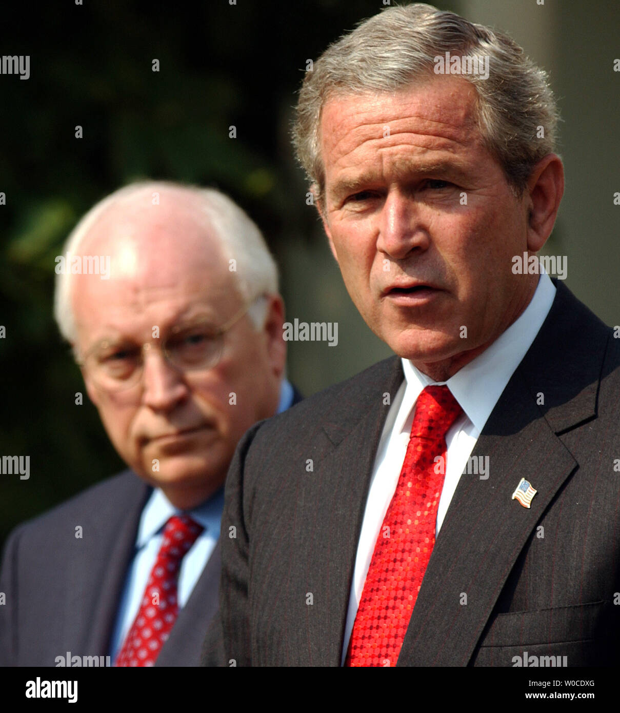 President George W. Bush speaks, as Vice President Dick Cheney listens ...
