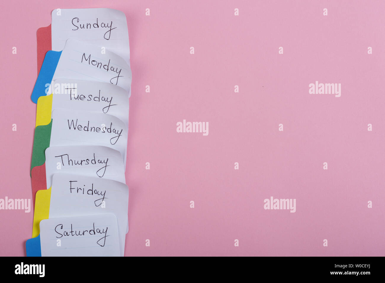 The days of the week - the paper stickers attached to the pink ...