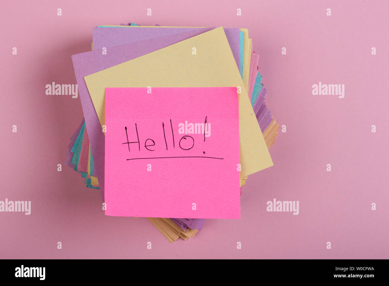 greeting concept - Stickers with the words "Hello" on pink background ...