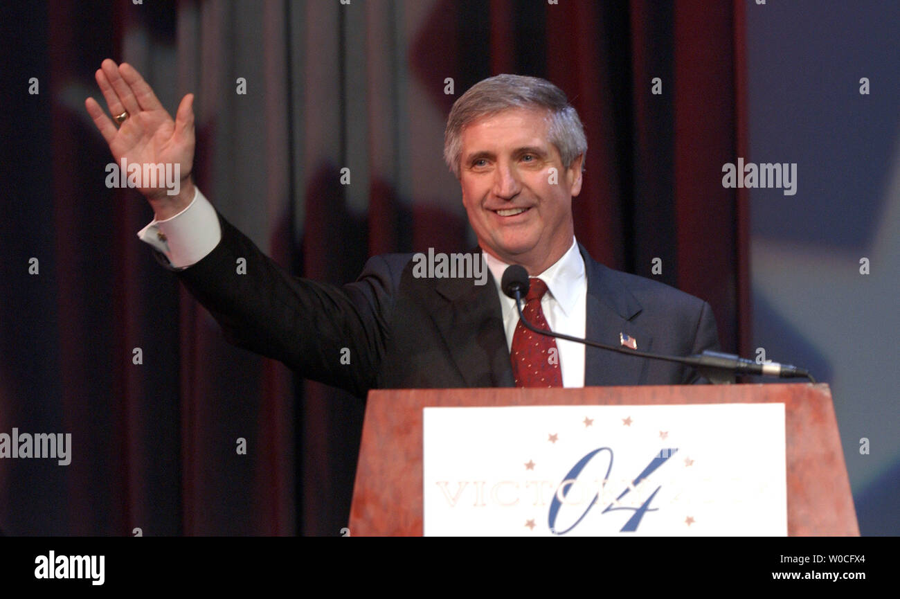 White House Chief of Staff Andy Card speaks to President Bush ...