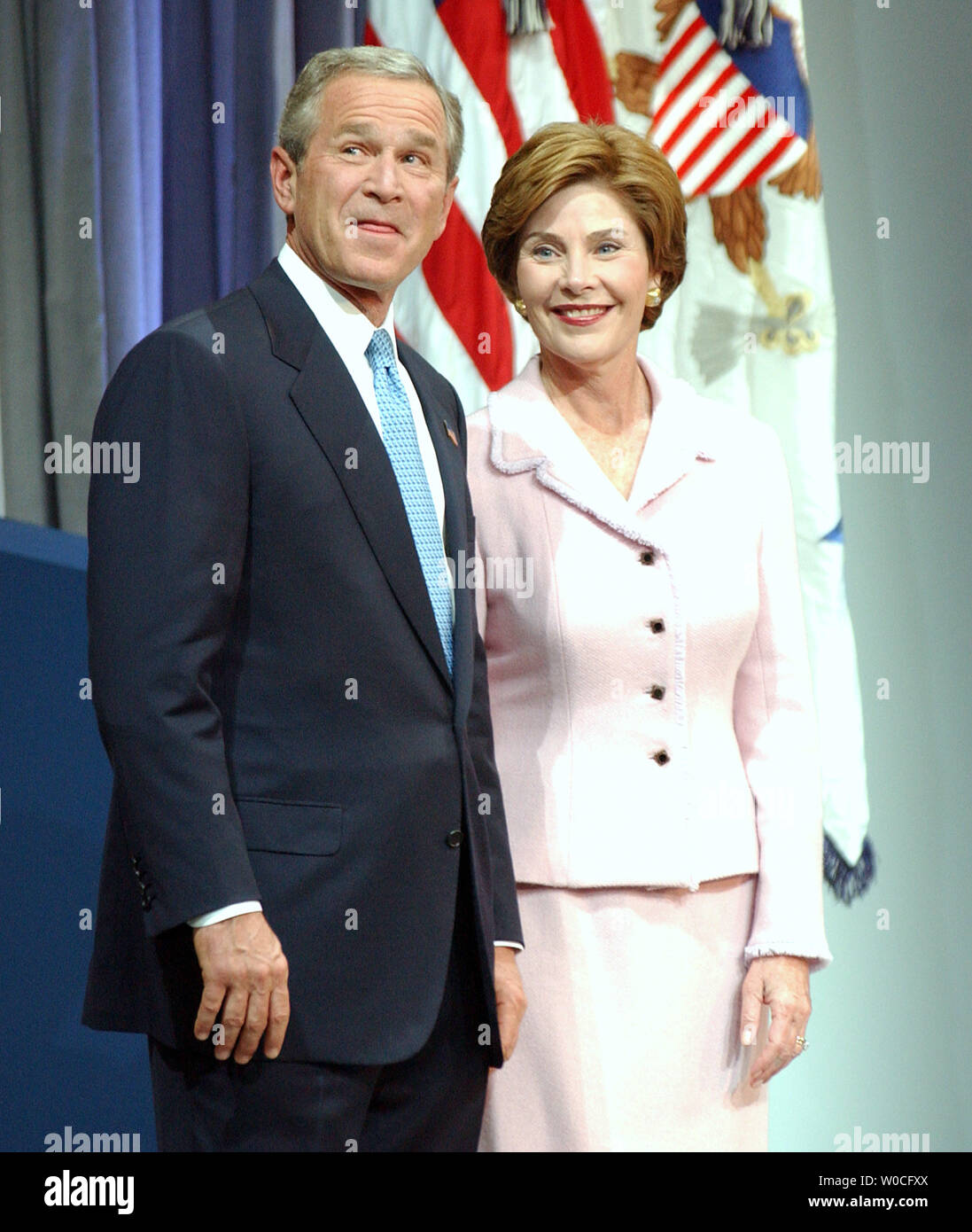 President George W. Bush and wife First Lady Laura Bush take the stage ...