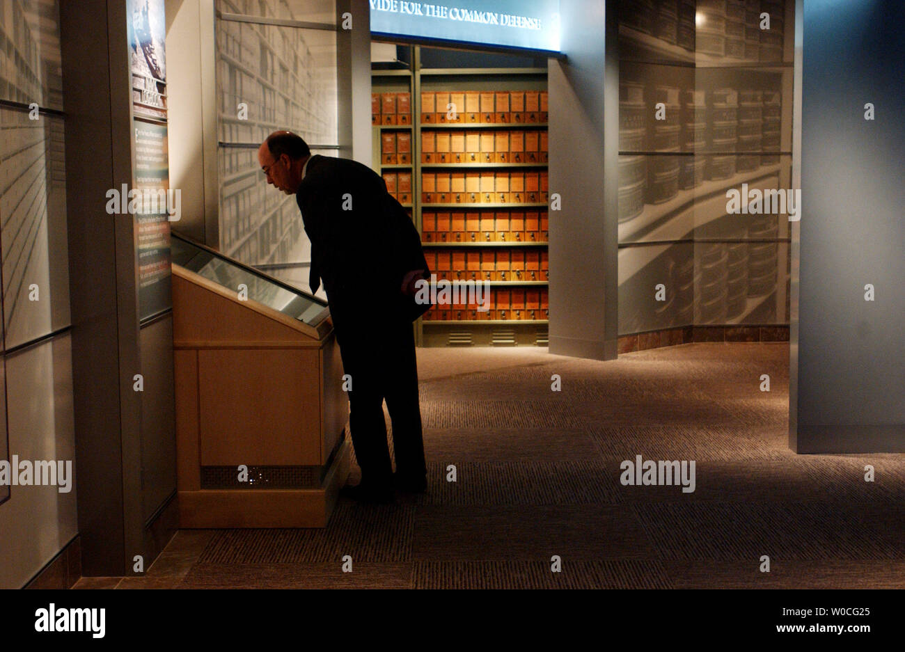 A member of the press looks through a new "Public Vaults" exhibit on ...