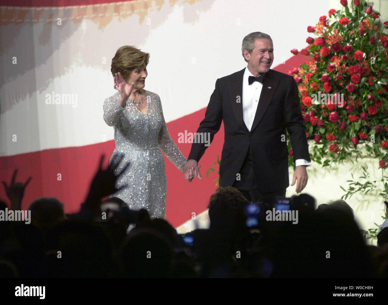 President George W. Bush and the First Lady Laura Bush share a dance as ...